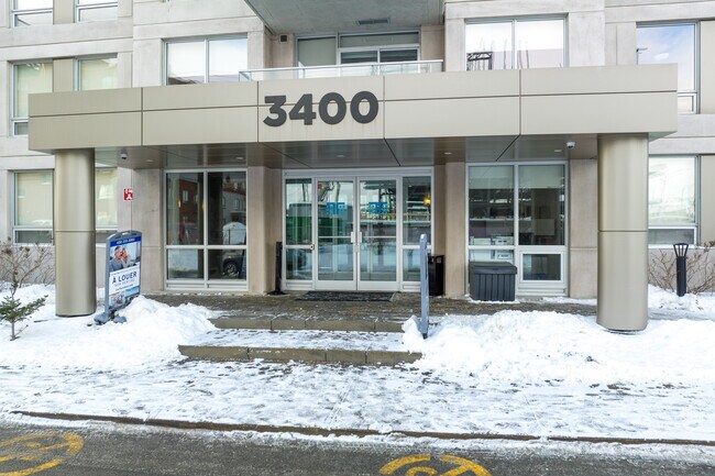 Axial Towers Apartments in Laval, QC | ApartmentHomeLiving.com